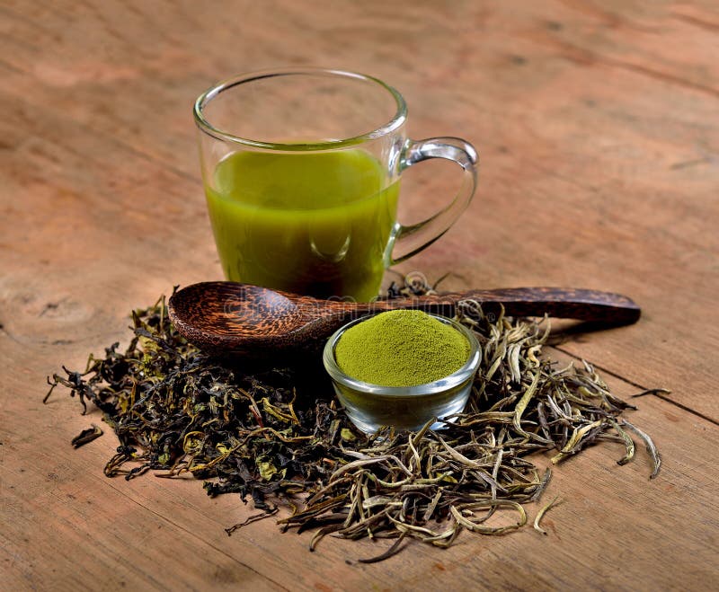 Dried Tea Leaf and Powder with Glass on Wood Stock Photo - Image of ...