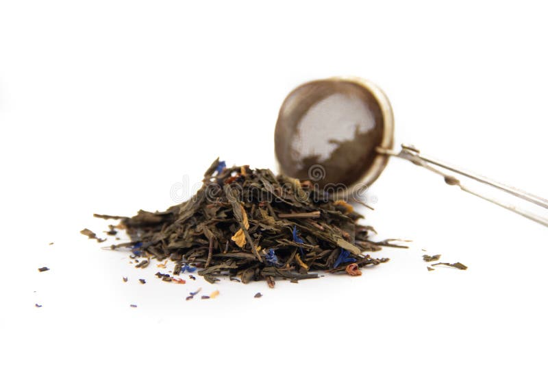 Dried Tea Leaves and Spoon for Brewing on a White Background. Stock ...