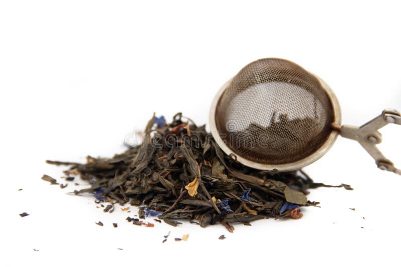 Dried Tea Leaves and Spoon for Brewing on a White Background. Stock ...