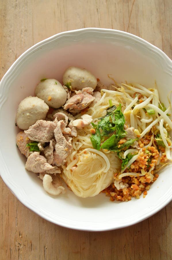 Dried Thin Rice Noodle with Pork Ball and Boiled Meat on Bowl Stock ...