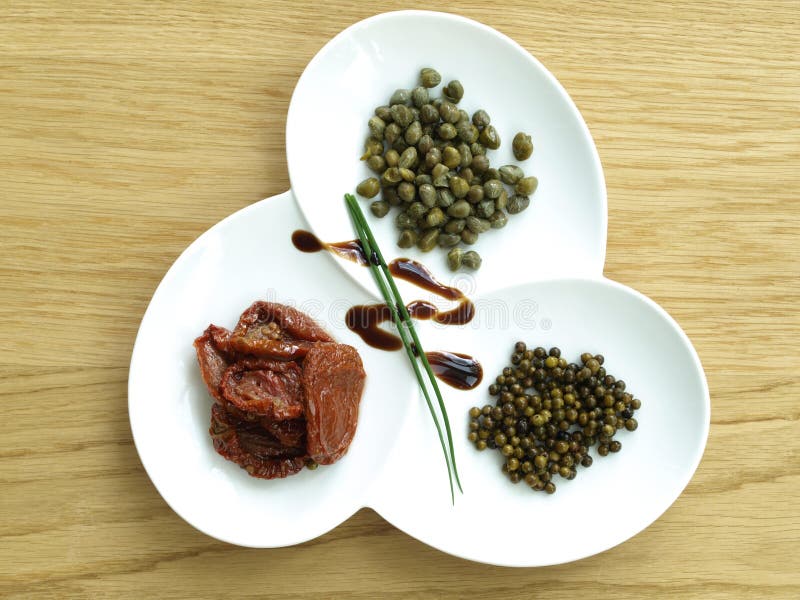 Dried Tomatoes, Capers, Pepper Stock Image - Image of cuisine, wood ...