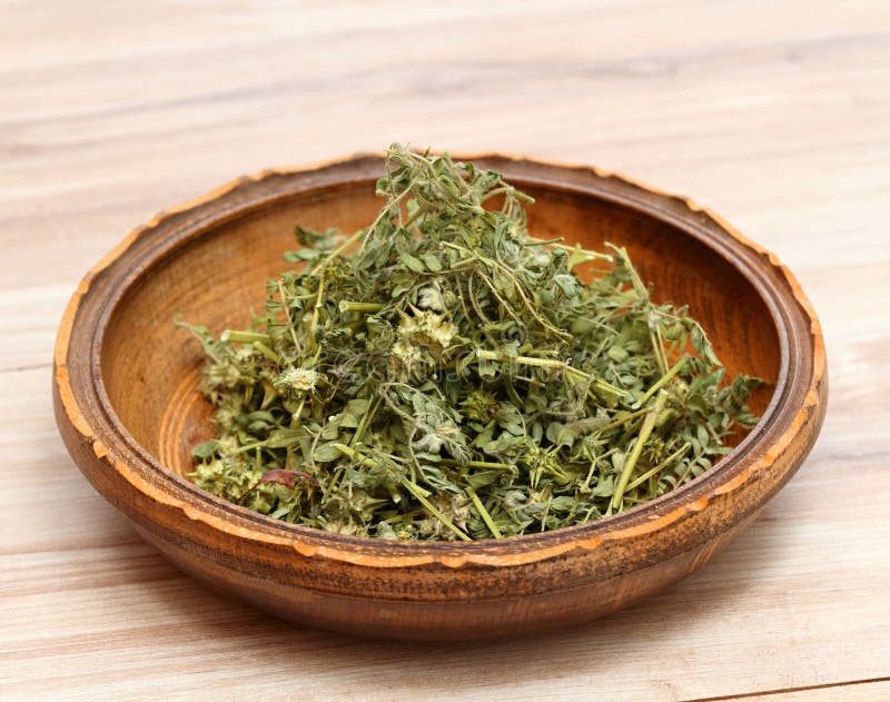 Dried Tribulus Terrestris in the Bowl Stock Photo - Image of wood ...