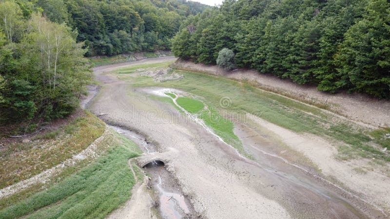A Dried-up Riverbed with the Remains of Civilization Stock Image ...