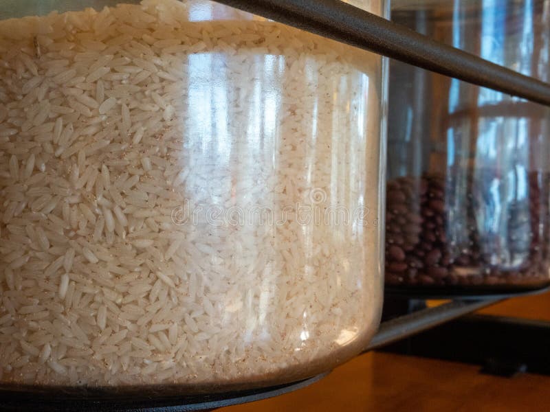 Dried White Rice Sitting in Large Glass Jar Sitting on Shelf Stock ...
