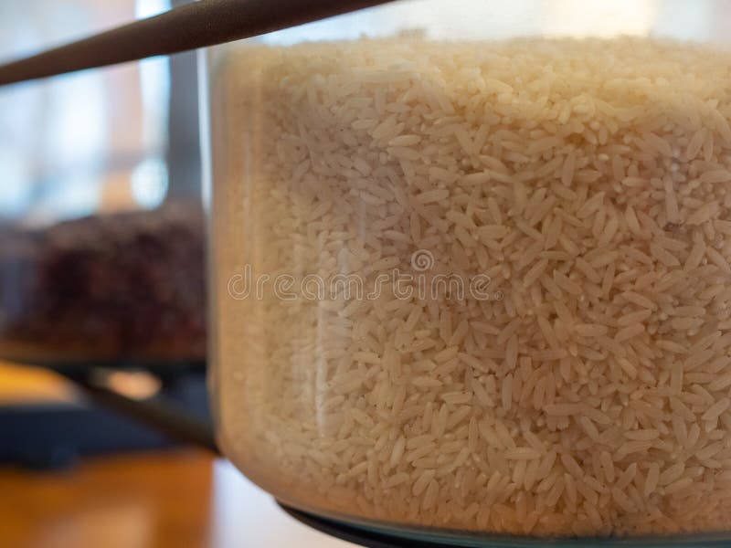 Dried White Rice Sitting in Large Glass Jar Sitting on Shelf Stock ...