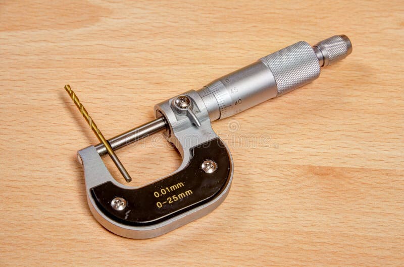 Old Micrometer on Brown Table Stock Photo - Image of engineering, steel ...