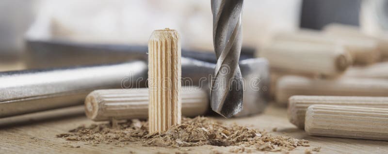 Drill Bit Makes Hole in Wooden Oak Board for Wooden Dowel Stock Image ...