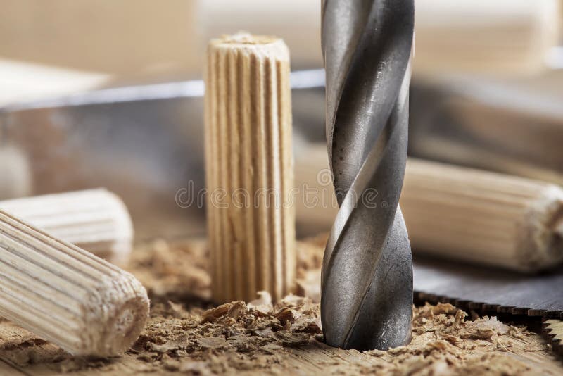 Drill Bit Makes Hole in Wooden Oak Board for Wooden Dowel Stock Image ...