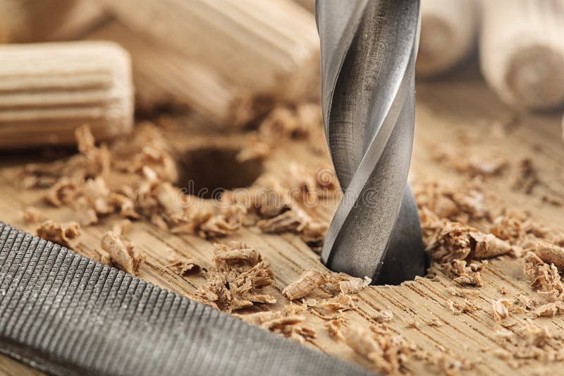 Drill Bit Makes Hole in Wooden Oak Board for Wooden Dowel Stock Image ...