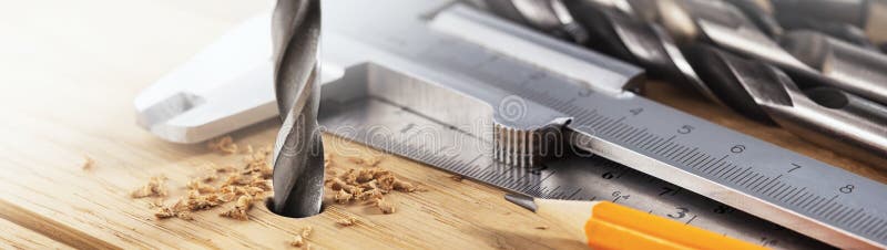 Drill Bit Making Hole in Wooden Oaks Plate, with Ruler and Caliper ...