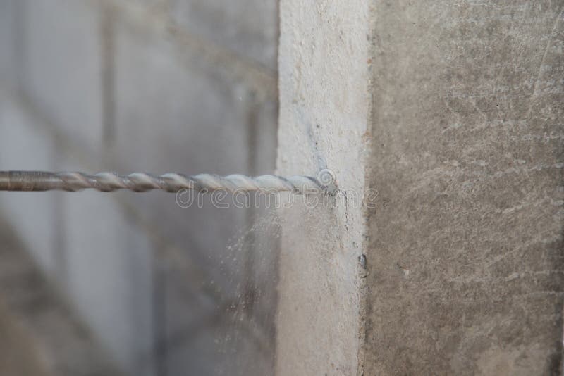 Drill on concrete pillar stock photo. Image of bodkin - 76270130