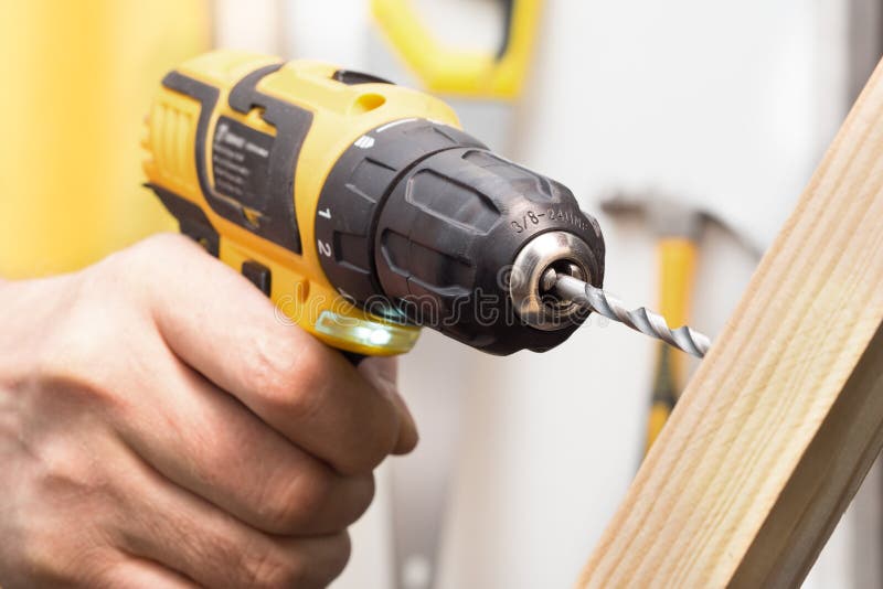The Drill Drills into the Wood Stock Photo - Image of instrument, work ...
