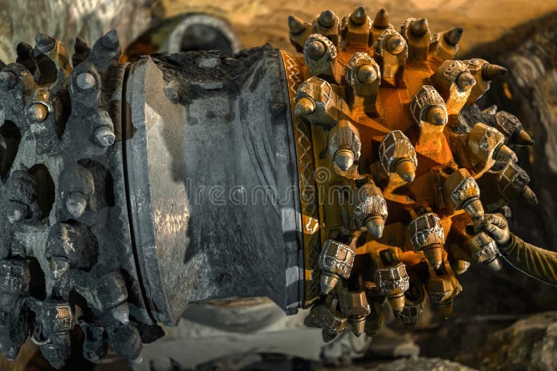 The Drill Head of a Mine Roadheader Close-up. the Drill is Equipped ...
