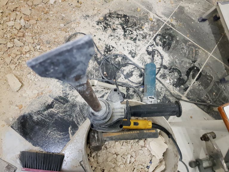 Drill from the Perforator, Chisel and Gates in the Brick Wall and ...