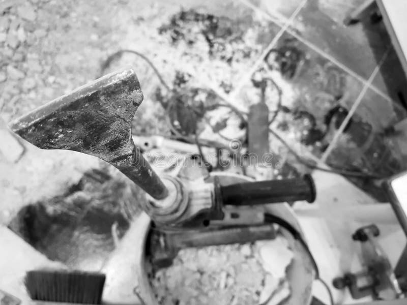 Drill from the Perforator, Chisel and Gates in the Brick Wall and ...