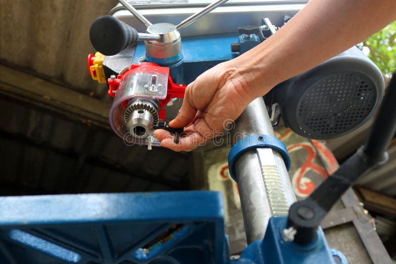 Drill Presses Machine with Machinist. Stock Image - Image of drilling ...