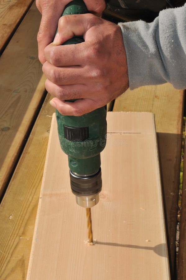 Drilling Holes in Laminated Plywood Stock Image - Image of wood, steel ...