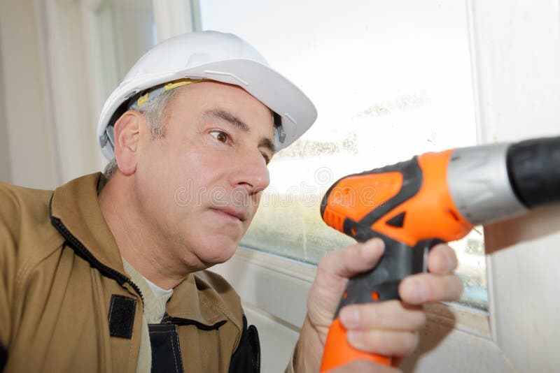 Window Setter Inspecting Window Stock Photo - Image of glazing ...