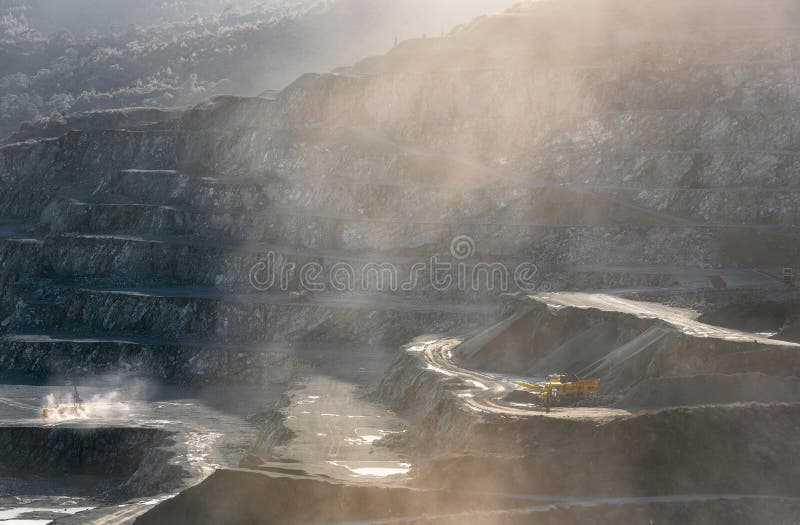 Drilling Machine on a Bench of Diabase Quarry in Misty Morning Stock ...
