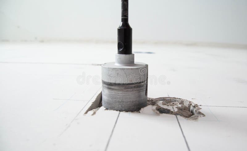 Drilling Holes in a Concrete Wall for Socket Boxes with a Diamond Core ...