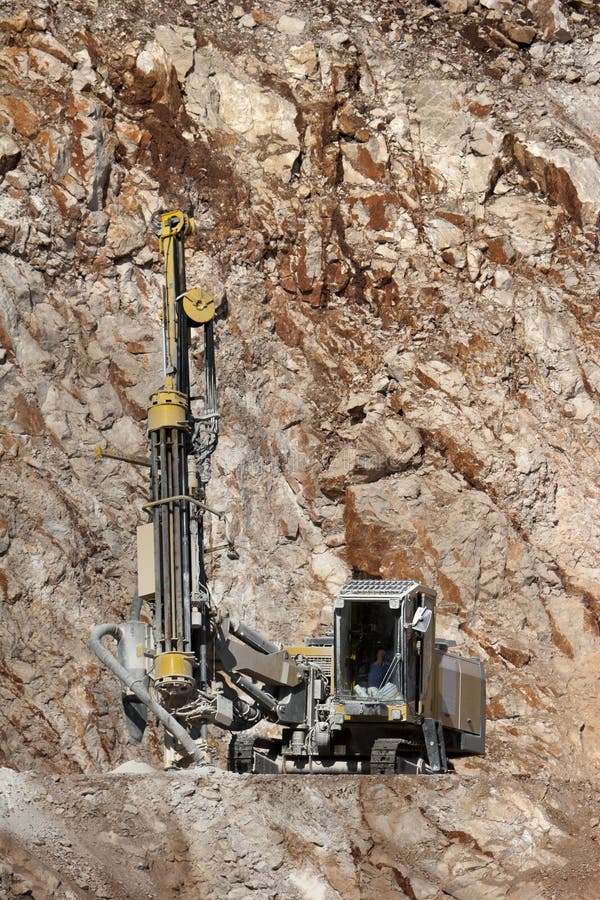 Drilling Holes for Demolition in a Quarry Stock Photo - Image of gravel ...