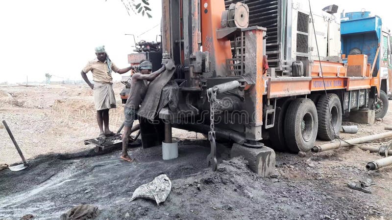 Drilling Machine Digging a Hole in the Ground for Water - Borewell ...