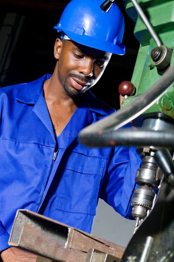 Drilling machine operator stock image. Image of african - 7671269