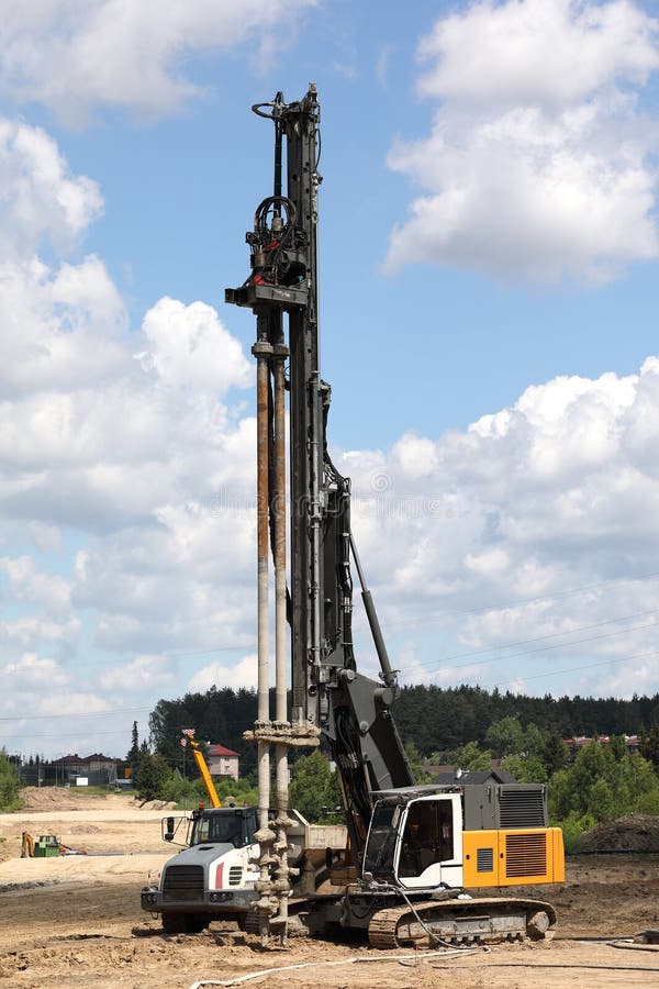 Drilling machine and truck stock image. Image of ground - 94846571