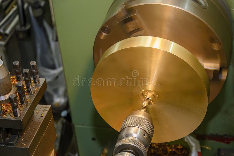 The Drilling Process at Brass Material Parts on Turning Machine Stock ...
