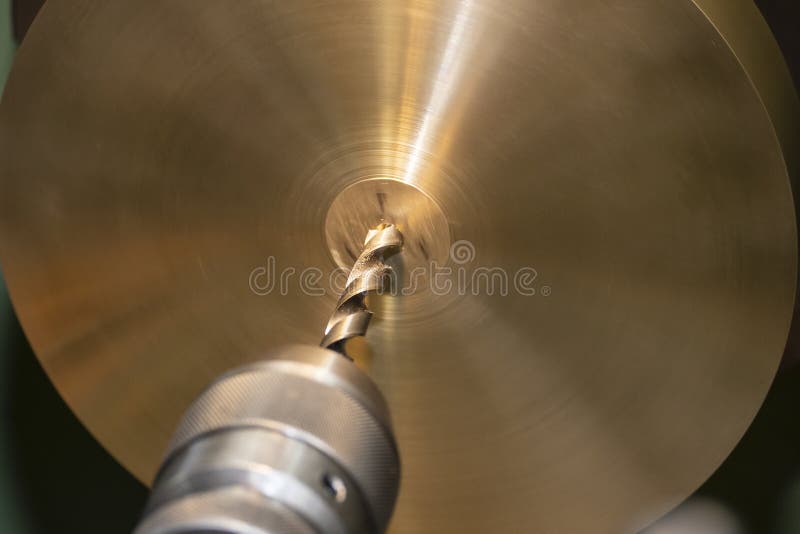 The Drilling Process Brass Plate on Lathe Machine. Stock Image - Image ...