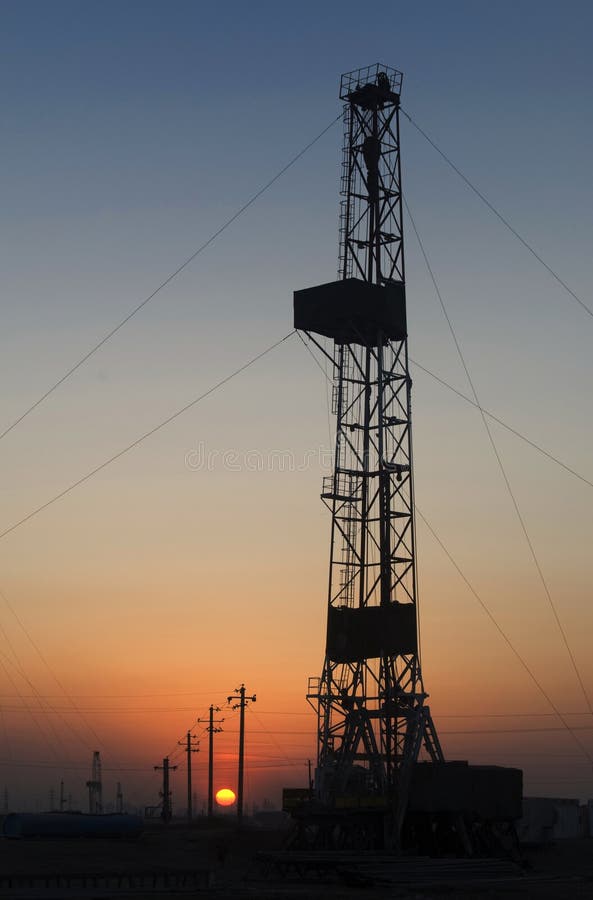 Work Over Rig, Pumpjack, and a Drilling Rig Stock Image - Image of ...