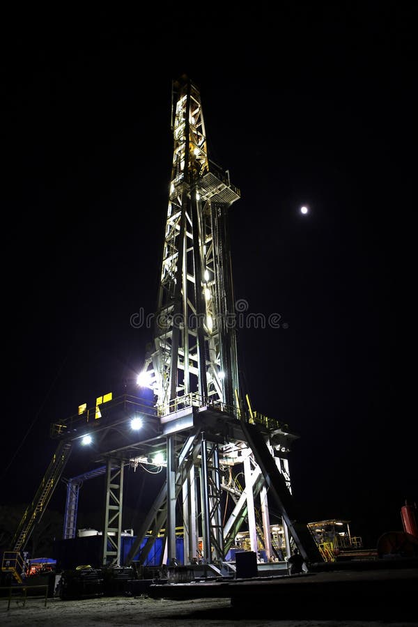 Drilling Rig at Night stock photo. Image of america, rotary - 305578