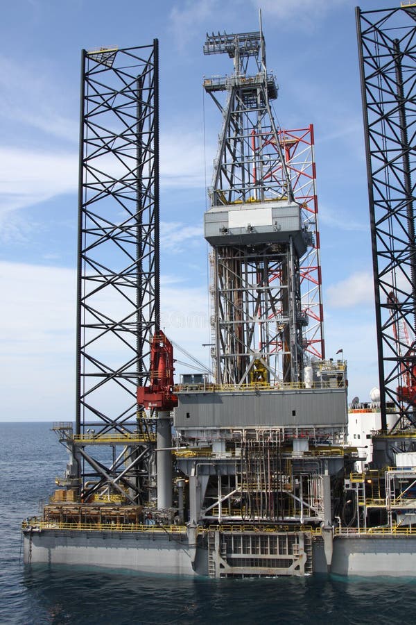 Drilling rig at the sea. stock photo. Image of industrial - 63584360