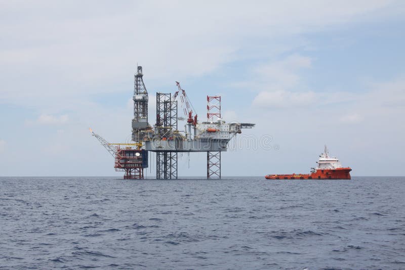 Drilling rig at the sea. stock photo. Image of industrial - 63584360