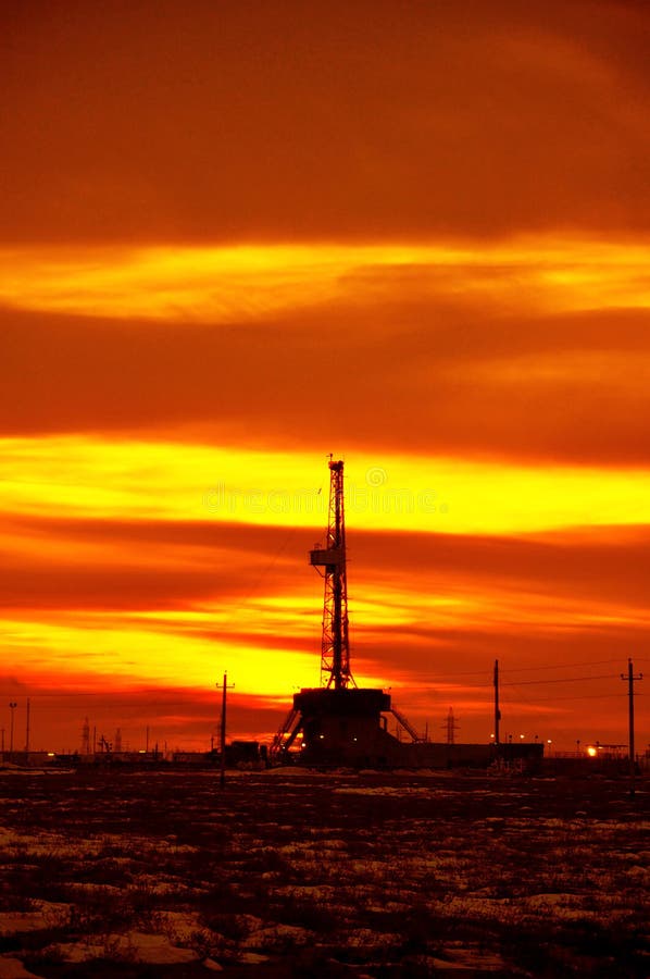 The Drilling Rig during Sunset Stock Photo - Image of oilfield ...