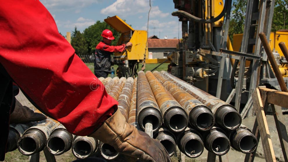 Drilling Rig and Two Oil Workers Stock Image - Image of hardwork, glove ...