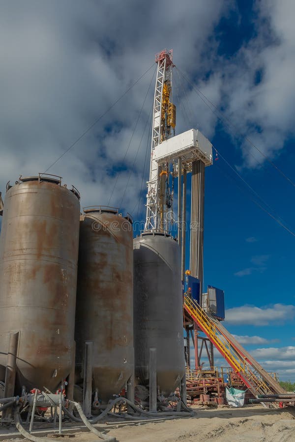 Drilling Rig & Gas Storage Tanks Stock Photo - Image of production ...