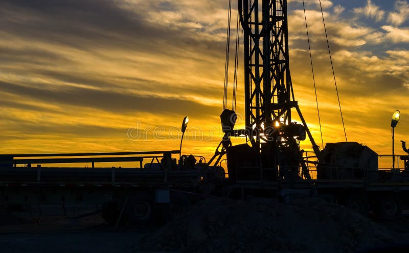 Drilling rigs daybreak stock image. Image of blue, rigs - 79712403