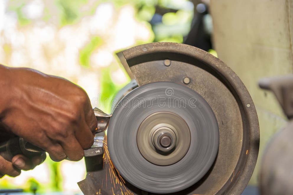 The Drilling Tool Manual Regrinding Process with Skill Operator Stock ...