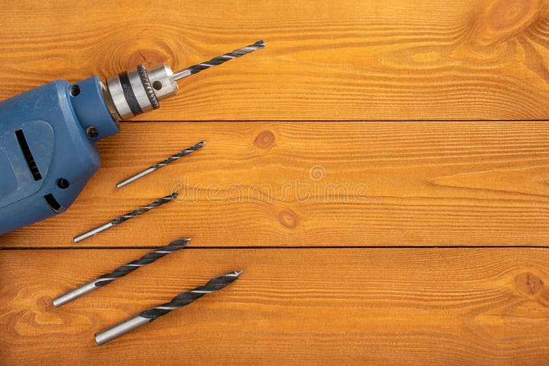 Drills and Borers on Wooden Table, Top View, Free Space for Text Stock ...