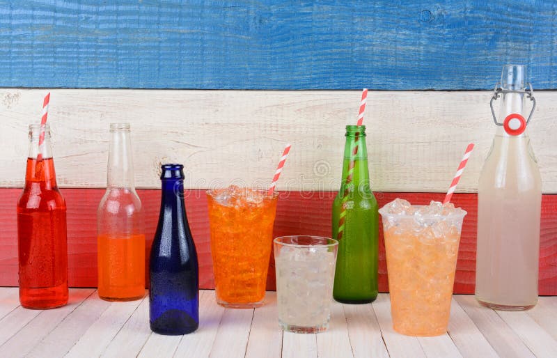 Assorted Soda Bottles in Ice Bucket Stock Photo - Image of orange ...