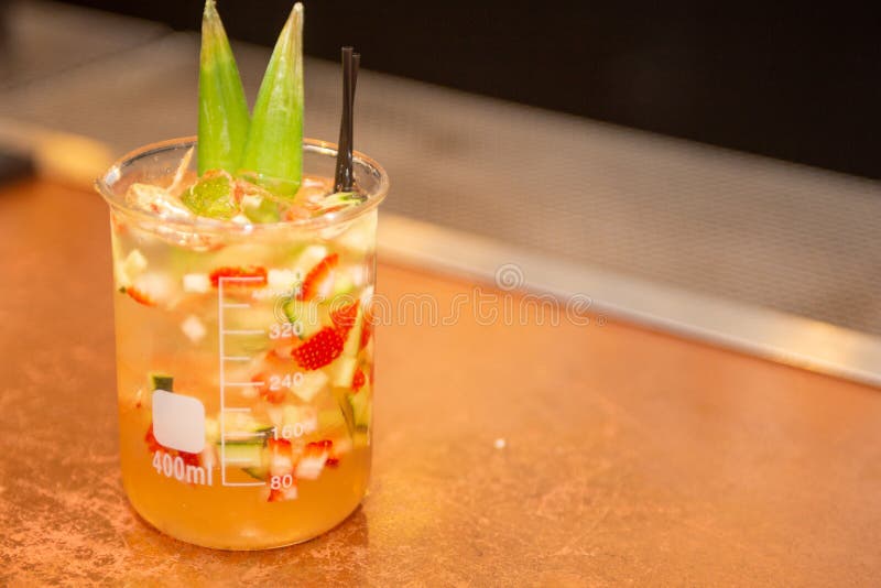 Drink in a beacker stock photo. Image of beaker, garnished - 268150288