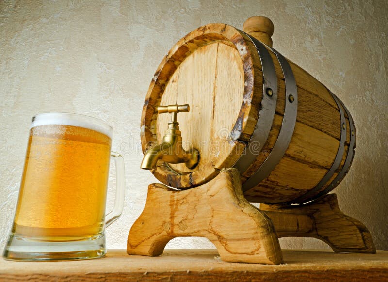 Beer and Barrel on the Wood Table Stock Photo - Image of beverage ...