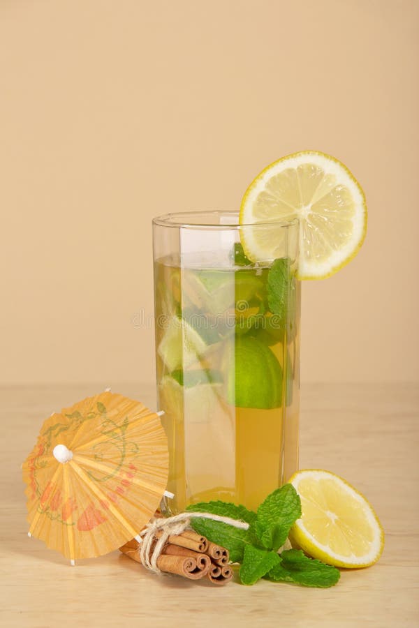 Drink Glass, Slice of Lemon and Cinnamon Stick Stock Photo - Image of ...