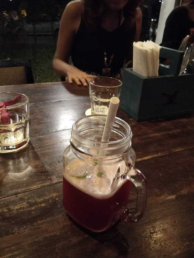 Drink Served on Table with Straw at Restaurant Stock Image - Image of ...