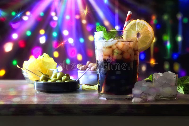 Drink and Snacks with a Disco Background with Colored Lights Stock ...
