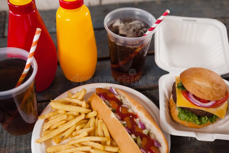 Drink and Snacks on Wooden Table Stock Image - Image of event, fries ...
