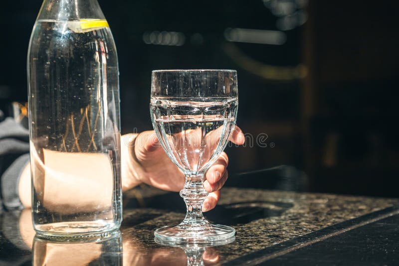 Drink Water Bottle with Glass on Table in the Restaurant. Stock Image ...