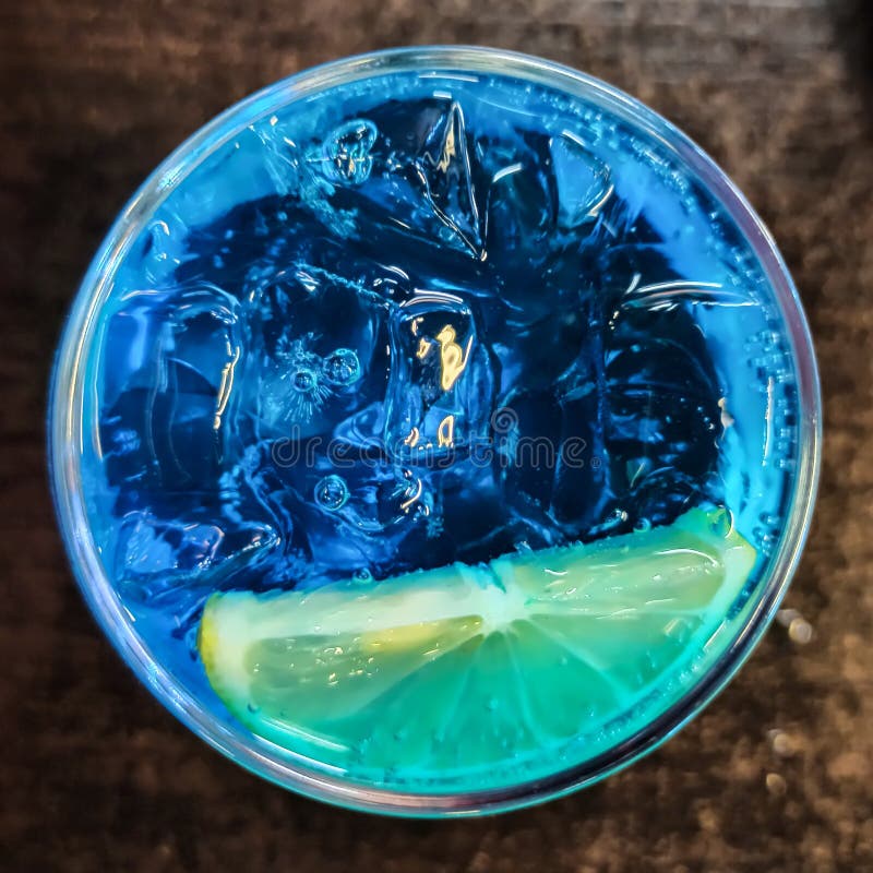Drinking Blue Cocktail with Lemon Stock Image - Image of cocktail ...