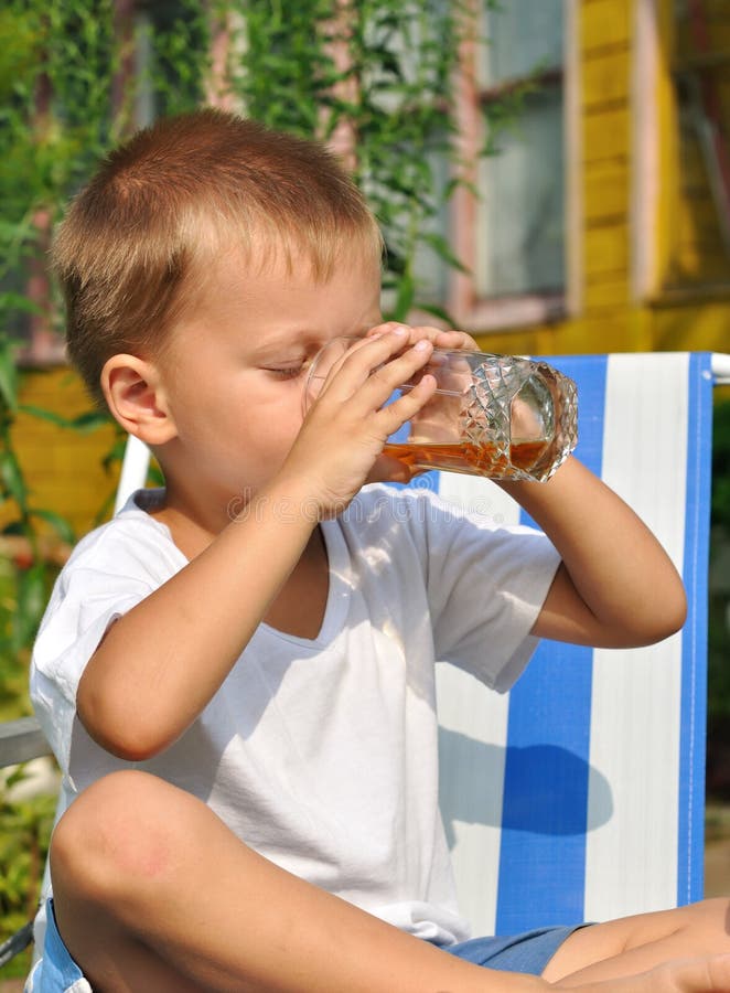 Drinking boy stock image. Image of child, apple, beverage - 15562567